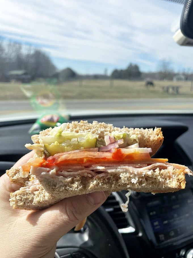 A sandwich so perfectly constructed it deserves its own blueprint. The turkey layers create a masterpiece of flavor engineering.