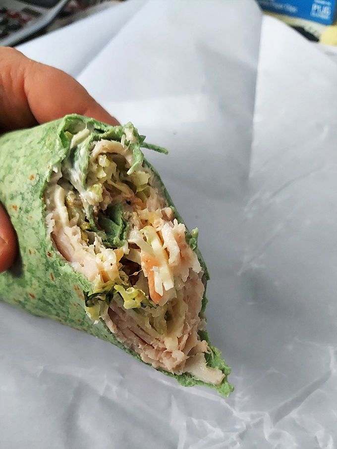 A wrap that's ready for its close-up! Layers of turkey and fresh veggies in a spinach tortilla&mdash;proof that healthy can still be indulgent.