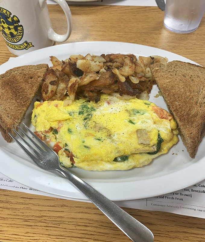 This isn't just an omelet&mdash;it's a garden harvest tucked into fluffy eggs. The kind of breakfast that makes vegetables feel like an indulgence rather than a virtue.