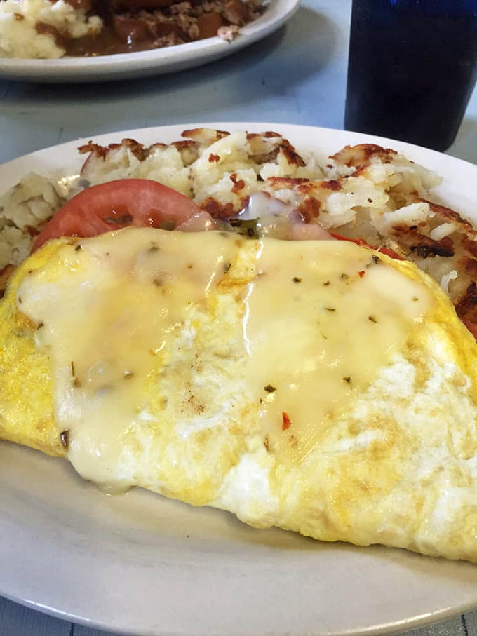 An omelet that's seen the veggie garden and hash browns with the perfect crisp-to-tender ratio &ndash; breakfast alchemy at its finest.