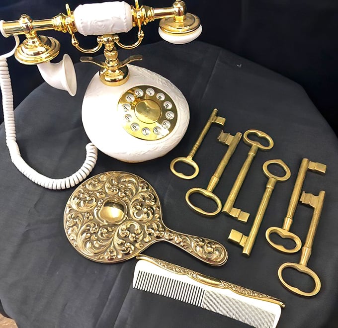 This vintage telephone and collection of skeleton keys whisper stories from another era. One person's outdated technology is another's conversation piece.