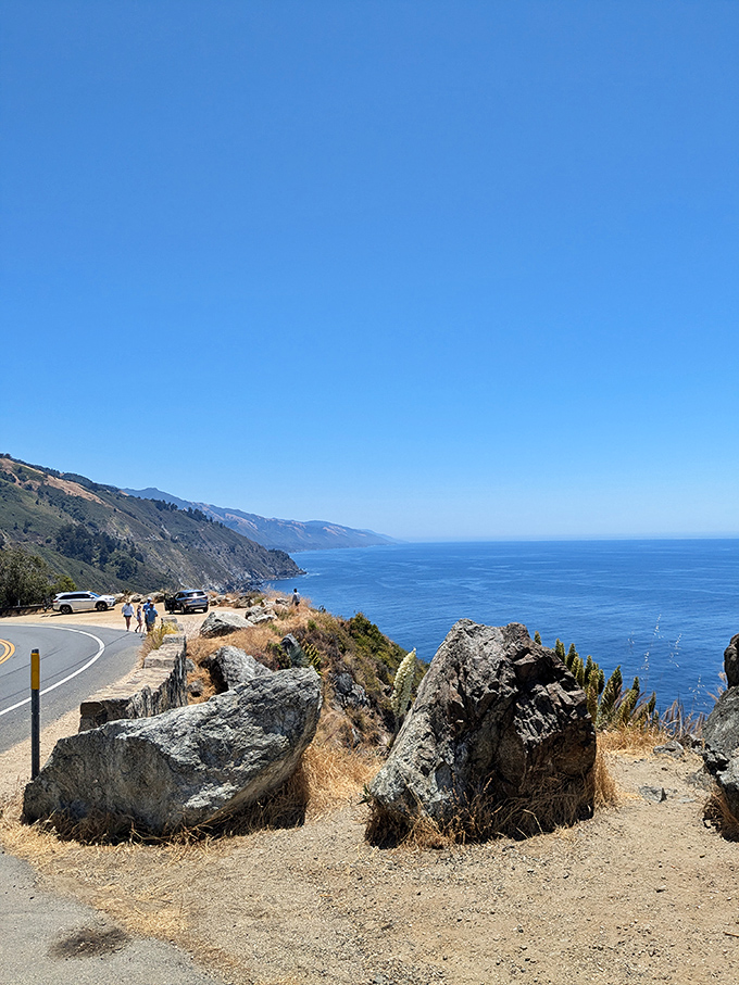 Pull-over spots become impromptu community gatherings where strangers bond over the shared experience of saying "Would you look at that view!"