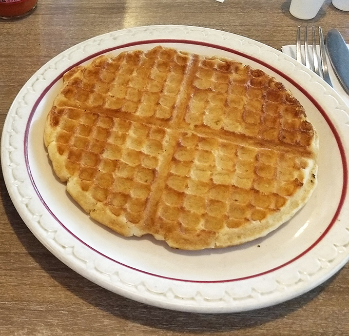 This waffle's perfect grid pattern isn't just for show&mdash;it's engineering genius designed to hold maximum butter and syrup in each delicious square.