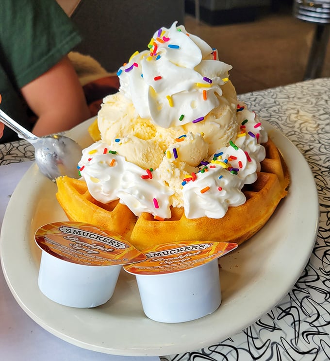 Waffle sundae nirvana! That ice cream melting into those golden squares creates a sweet treaty between hot and cold that should win a Nobel Prize.