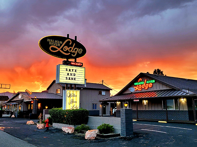 The Walker River Lodge sign glows against a sunset so dramatic it looks Photoshopped, proving that nature remains the ultimate Instagram filter.