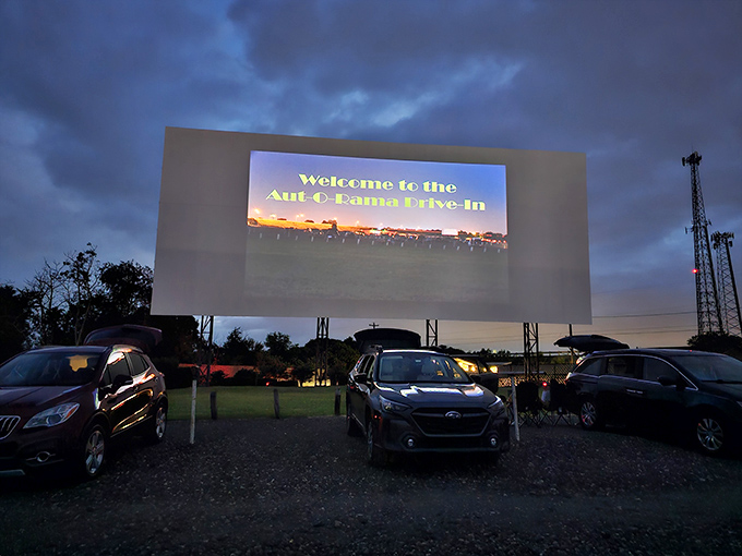 As dusk settles, the welcome message glows to life&mdash;the modern world fades away and for the next few hours, nothing exists beyond this gravel lot.