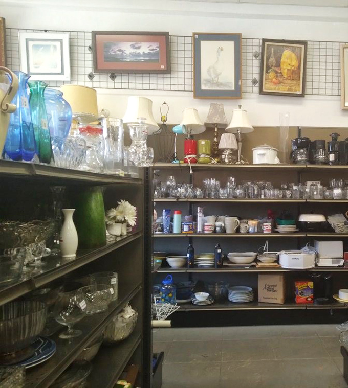 Glassware galore meets framed nostalgia on the walls—proof that one generation's knick-knacks become another's treasured finds.