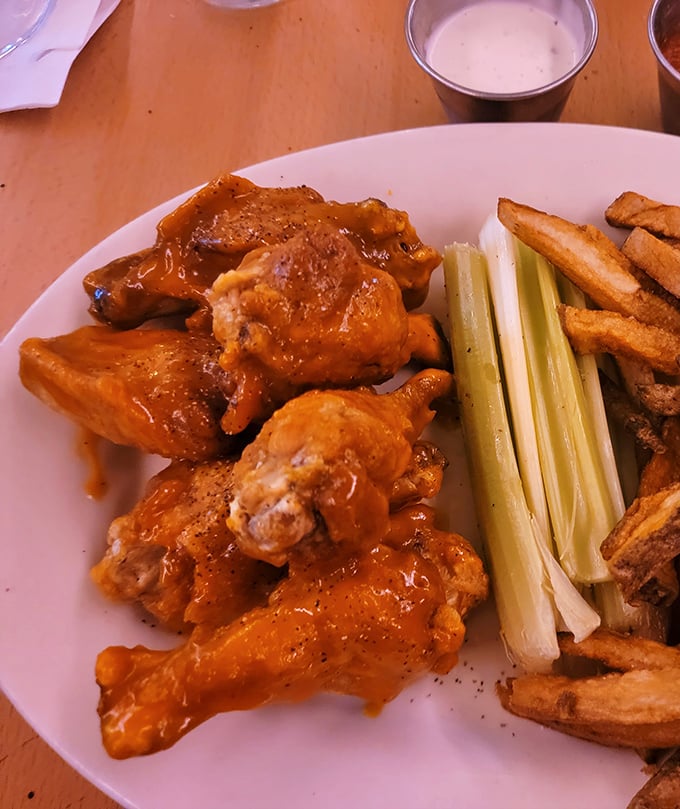 Wings that achieve the perfect balance between "napkin necessary" and "worth every messy bite."