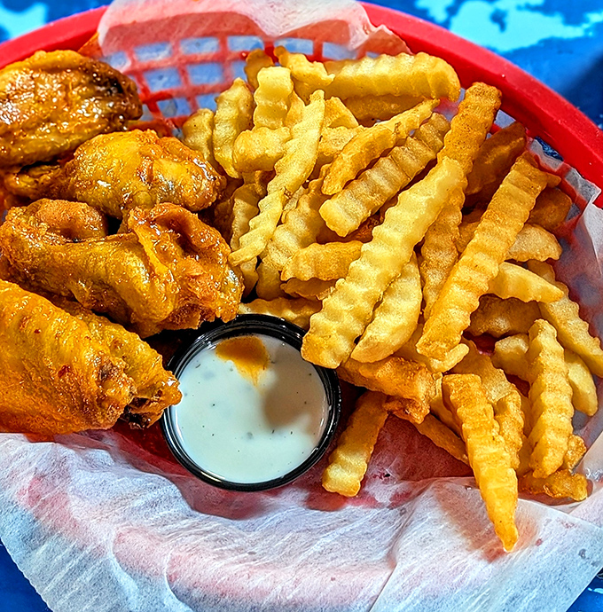 Golden-fried wings and crinkle-cut fries&mdash;the perfect supporting cast to an oyster feast. Sometimes the sidekicks deserve their own standing ovation.