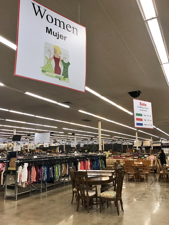 The women's section beckons with racks of possibility, where vintage treasures hide among everyday staples like diamonds in plain sight. 