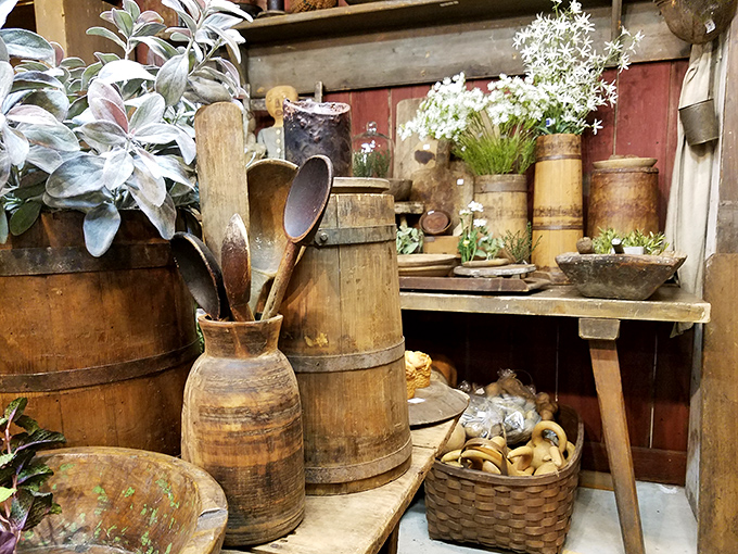 Weathered wooden vessels tell stories of kitchens past while hosting today's charming floral displays.