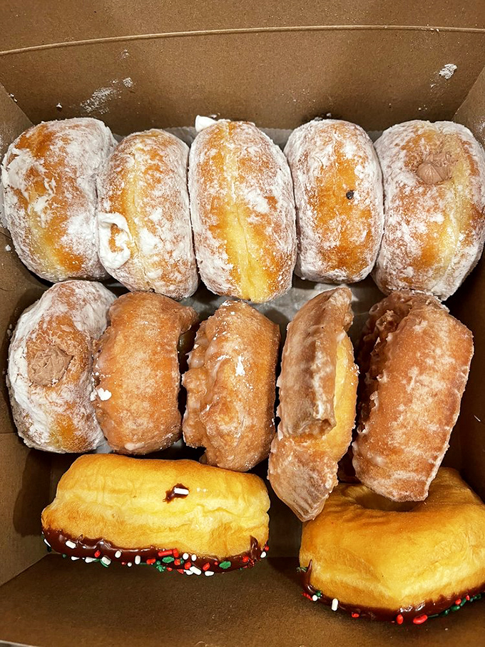 A cardboard ark of powdered, glazed, and holiday-sprinkled treasures. Breakfast of champions? Absolutely.