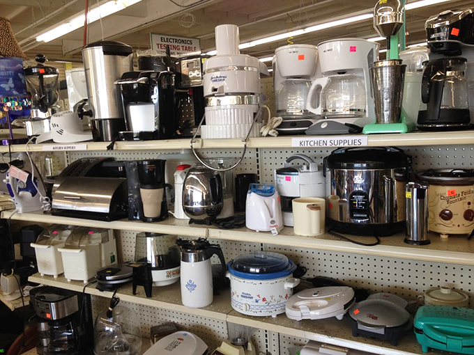 Kitchen appliances galore! Someone's abandoned bread maker could become your Sunday morning ritual. Coffee makers stand at attention, ready for their second act.