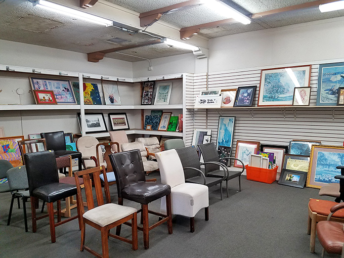 An art gallery meets furniture showroom where yesterday's chairs and tomorrow's conversation pieces mingle under fluorescent gallery lighting.