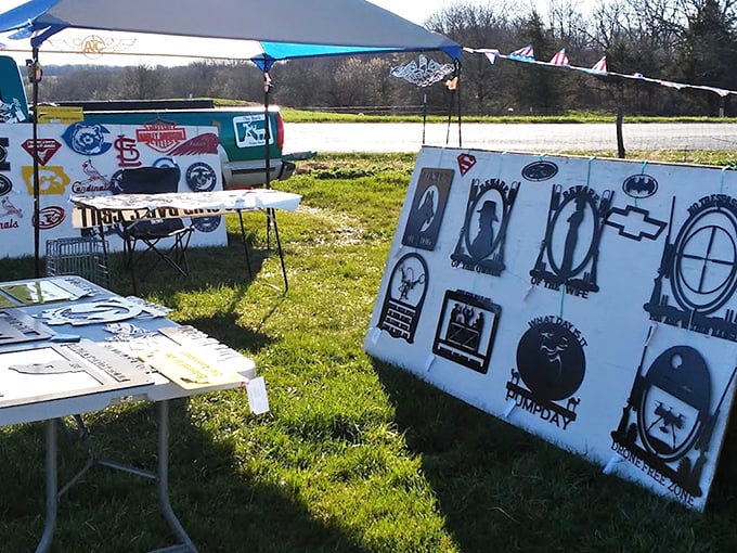 Sports fans, take note! This booth celebrates team loyalty with metal art that won't fade like last season's playoff hopes.
