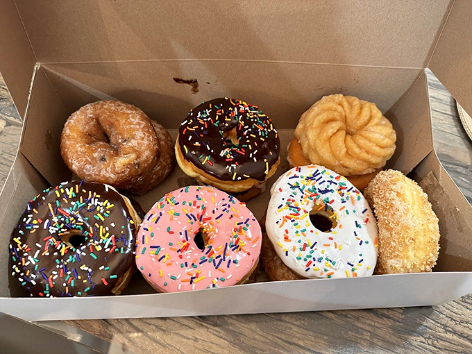 Donut box of dreams. Six different paths to happiness, all conveniently packaged in one cardboard container.