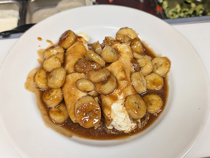 Bananas Foster: where fruit meets fire and transforms into a caramelized masterpiece that makes you question why you ever saved room for dessert.