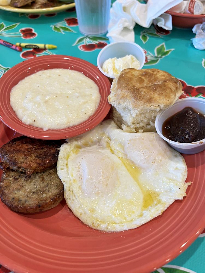 The Flying Biscuit Breakfast in all its glory&mdash;where eggs, grits, and that famous biscuit unite for morning magnificence.
