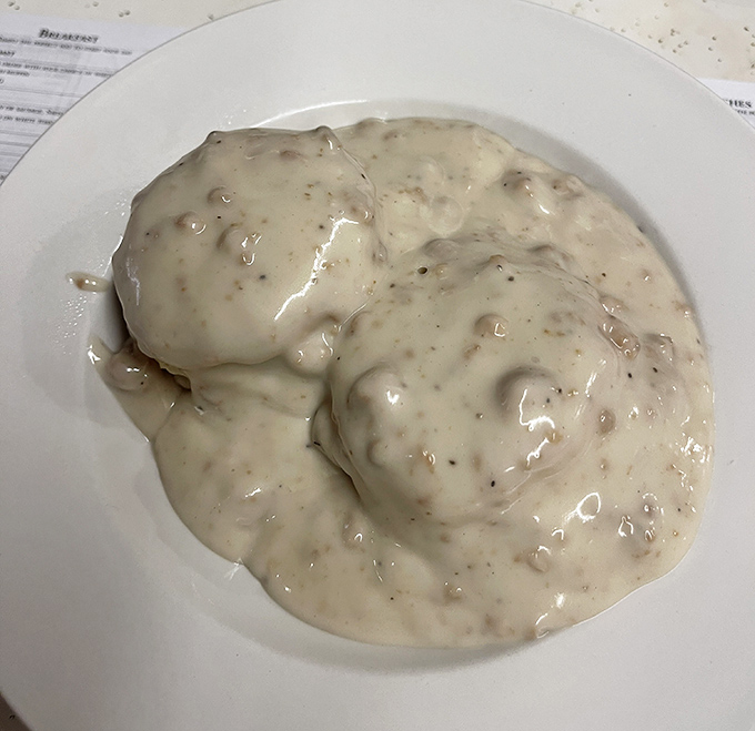 Biscuits and gravy that don't just sit on the plate&mdash;they embrace it, a creamy, peppery blanket that's worth every single calorie.