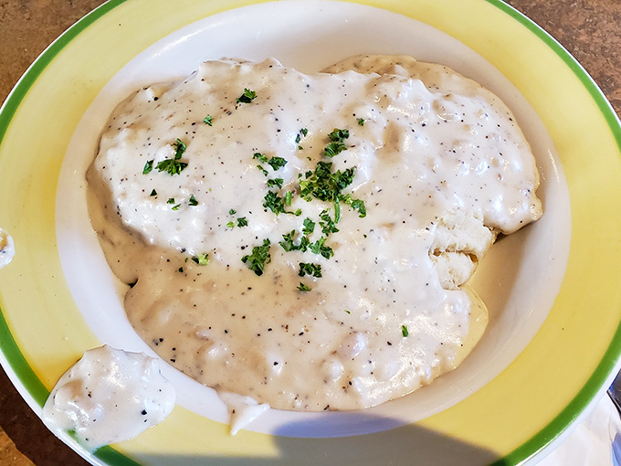 Biscuits and gravy: the comfort food equivalent of a warm hug from your favorite grandparent, with extra pepper for personality.