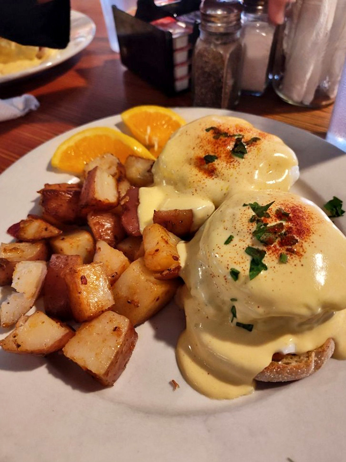 Eggs Benedict reimagined with such hollandaise perfection, it's the breakfast equivalent of finding an extra $20 in your winter coat pocket.
