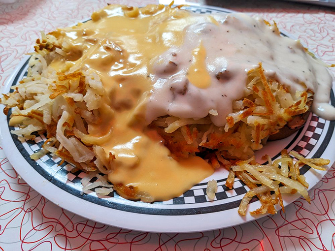 The Breakfast Horseshoe: where hash browns, cheese sauce, and gravity-defying deliciousness meet. Your arteries may protest, but your soul will sing.