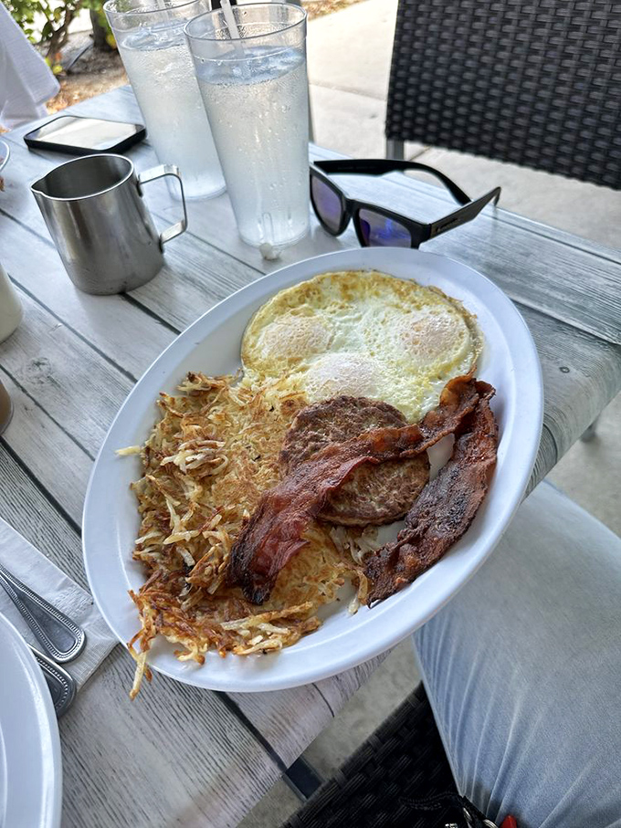 Eggs, hash browns, and bacon&mdash;the holy breakfast triumvirate executed with the precision of a culinary symphony. Simple yet profound.