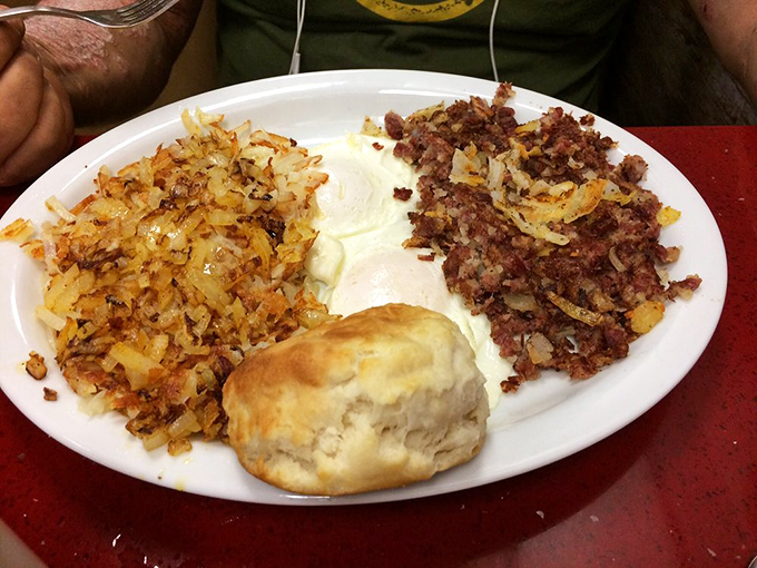 The breakfast platter that answers the eternal question: "Why choose between hash browns, corned beef hash, and biscuits when you can have it all?"