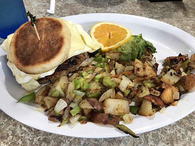 This breakfast sandwich with a side of home fries isn't trying to impress food critics&mdash;it's trying to cure what ails you, one hearty bite at a time.