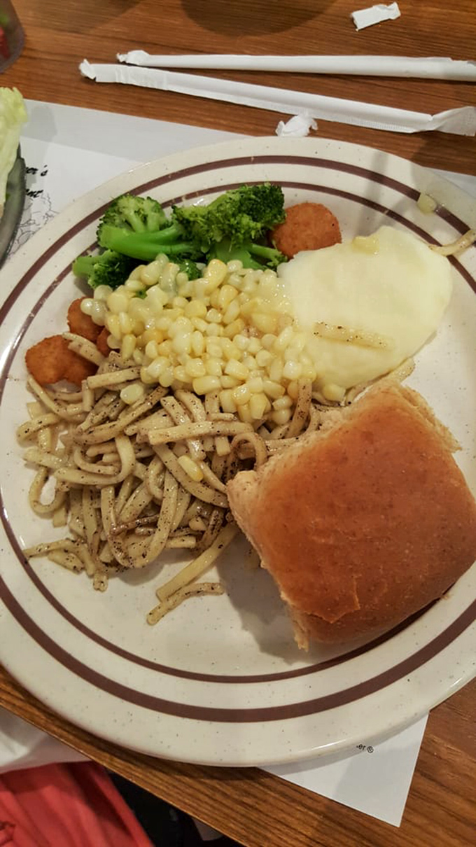 Buttered noodles, mashed potatoes, and a roll&mdash;the holy trinity of "I might need a nap after this" satisfaction.