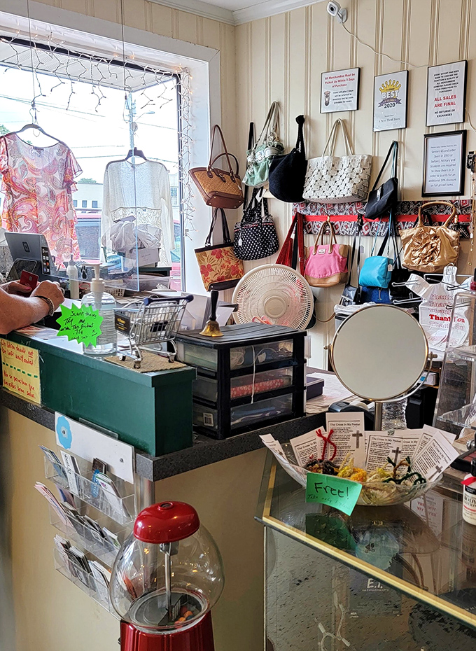 The checkout area doubles as a handbag gallery, where vintage purses hang like art installations waiting for their next adventure.