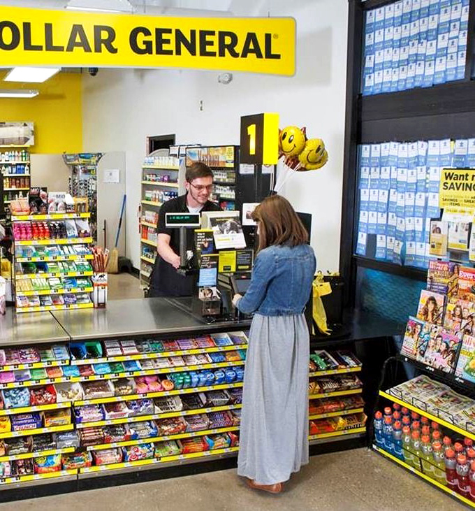 The checkout area&mdash;final frontier of impulse purchases where willpower goes to die amid candy bars and seasonal trinkets.
