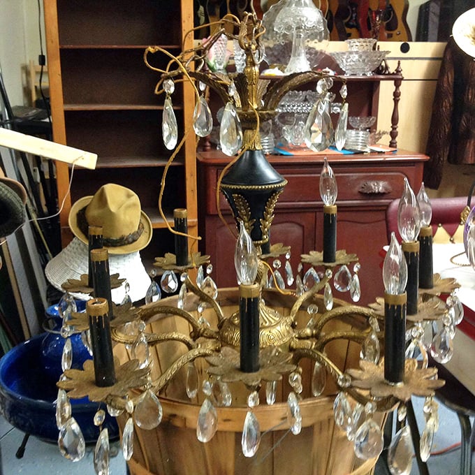 Crystal teardrops cascade from this vintage chandelier—imagine the dinner conversations it once illuminated in some Ohio family's dining room.