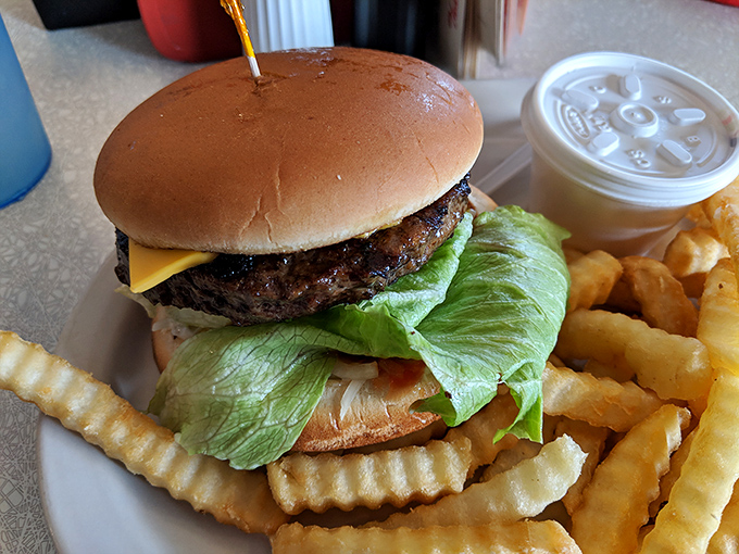 This cheeseburger and its crinkle-cut companions look like they stepped out of a Norman Rockwell painting, only tastier.