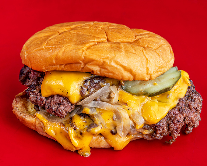 This isn't just a cheeseburger; it's a masterclass in the art of smashing, with lacy edges that crisp up like nature intended.