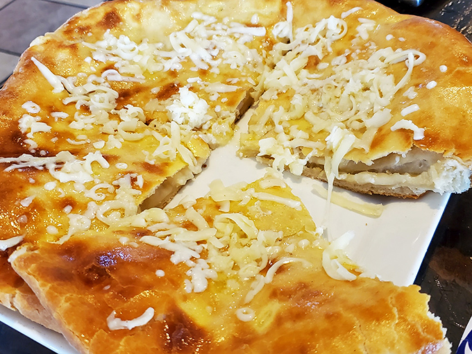 Cheese pulls for days! This khachapuri flatbread is what would happen if pizza and fondue had a delicious love child.