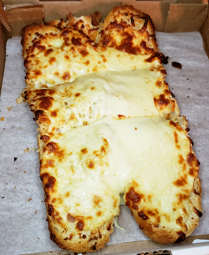 Cheesy bread that stretches the definition of "appetizer." This could be a meal itself&mdash;golden-brown, pull-apart perfection that demands to be shared. 