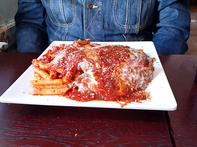Pasta dreams are made of this: tender pasta smothered in rich tomato sauce and blanketed with melted cheese that stretches with each heavenly forkful.