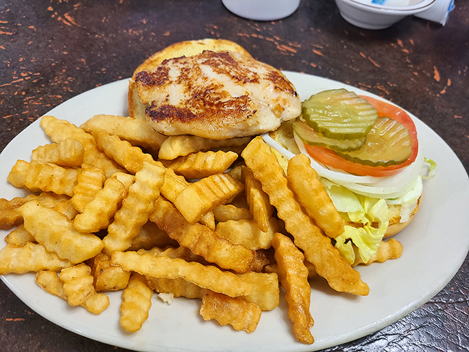 A perfectly grilled sandwich flanked by golden crinkle-cut fries&mdash;the lunch combo that's been solving midday hunger crises since before "foodie" was even a word.