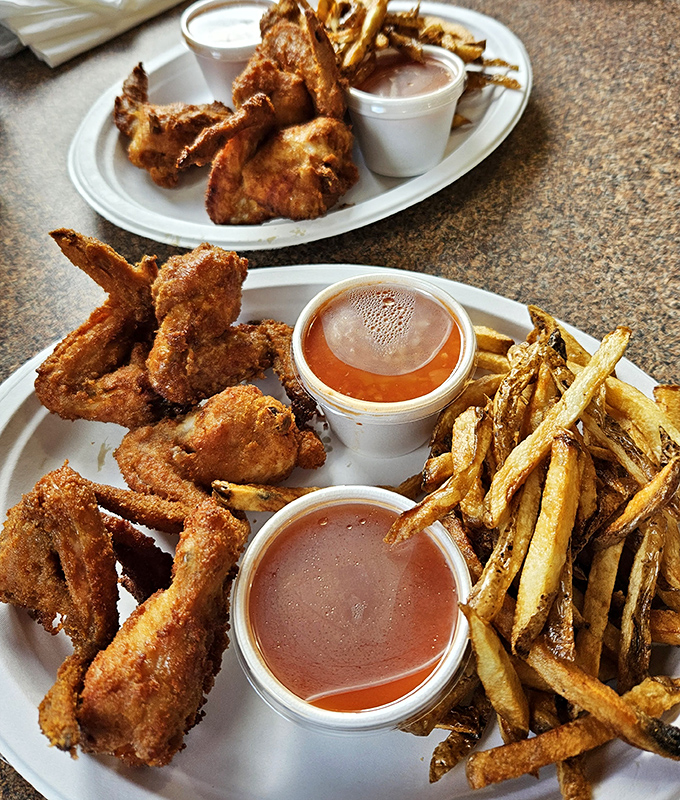 Wings and hot sauce that make Buffalo weep with jealousy. The Serbian-style preparation creates a crispness that defies chicken physics.