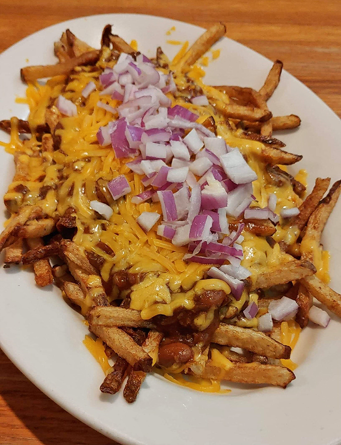 Cheese fries that don't pretend to be anything but what they are: a glorious, unapologetic celebration of America's love affair with melted cheddar.
