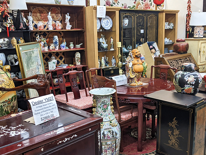 An elegant display of Asian-inspired furniture and decorative pieces creates a sophisticated corner that would make any interior designer swoon.