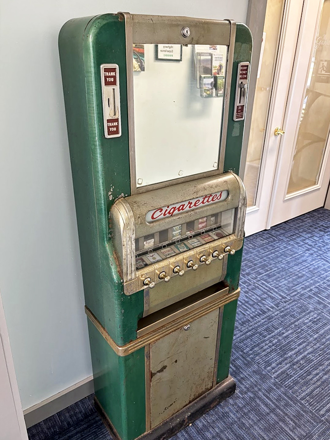 Before vape pens and warning labels, there was this art deco cigarette machine—a chrome-trimmed relic of roadside Americana.