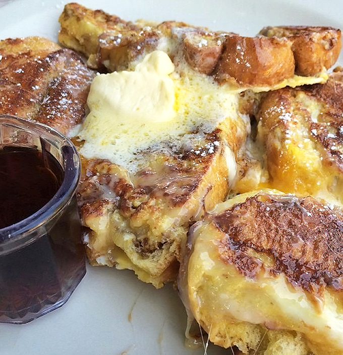 Cinnamon roll French toast: where breakfast meets dessert and nobody's complaining. Worth every calorie and potential food coma.