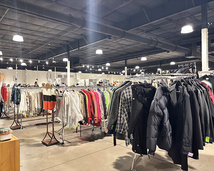 Winter coats and jackets lined up like old friends at a reunion, each with stories to tell and warmth to offer at a fraction of retail.