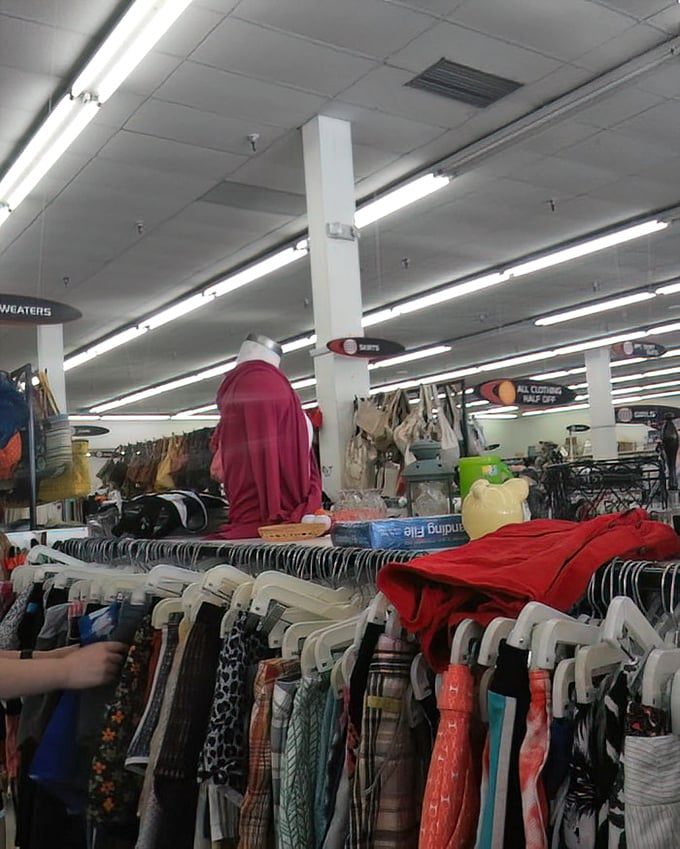 The clothing section resembles an archaeological dig through American fashion history. Each layer reveals treasures from different eras, all priced for everyday budgets.