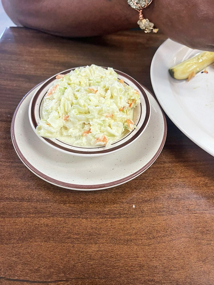 This isn't just coleslaw; it's a creamy, crunchy counterpoint to rich main dishes that brings balance to the universe, one forkful at a time.
