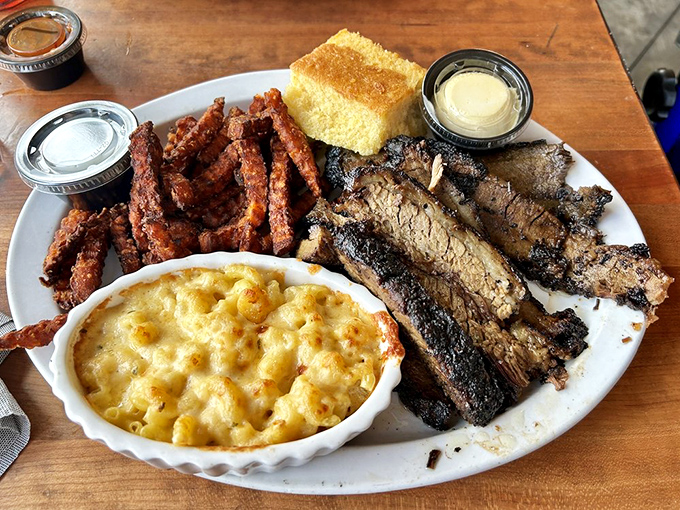 A plate that doesn't know the meaning of restraint &ndash; smoky ribs, sweet potato fries, and mac and cheese that's worth every extra minute at the gym.