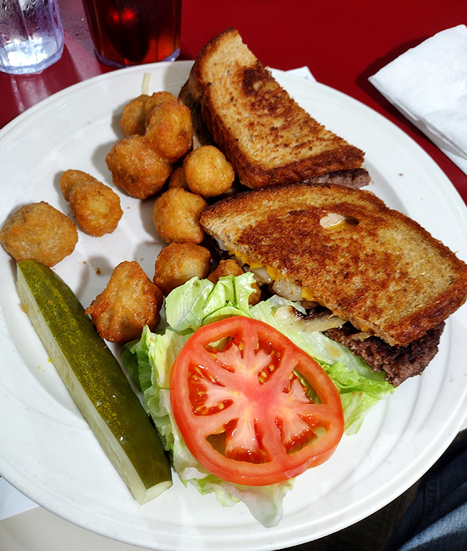 A classic diner patty melt with tater tots&mdash;proof that sometimes the simplest combinations create the most profound happiness on a plate.