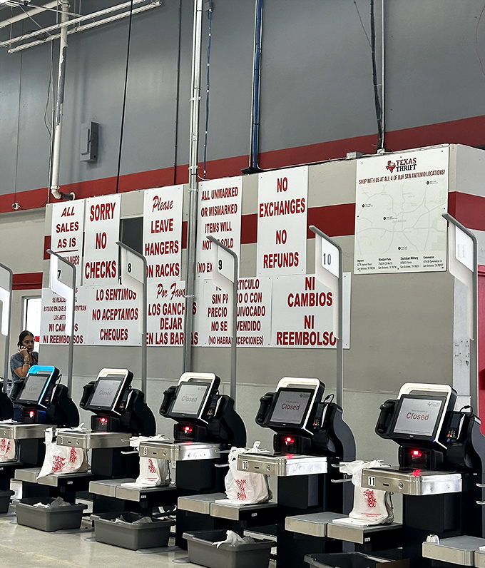 The checkout area lays down the law in two languages. All sales final&mdash;a reminder that thrifting, like life, requires commitment to your choices.